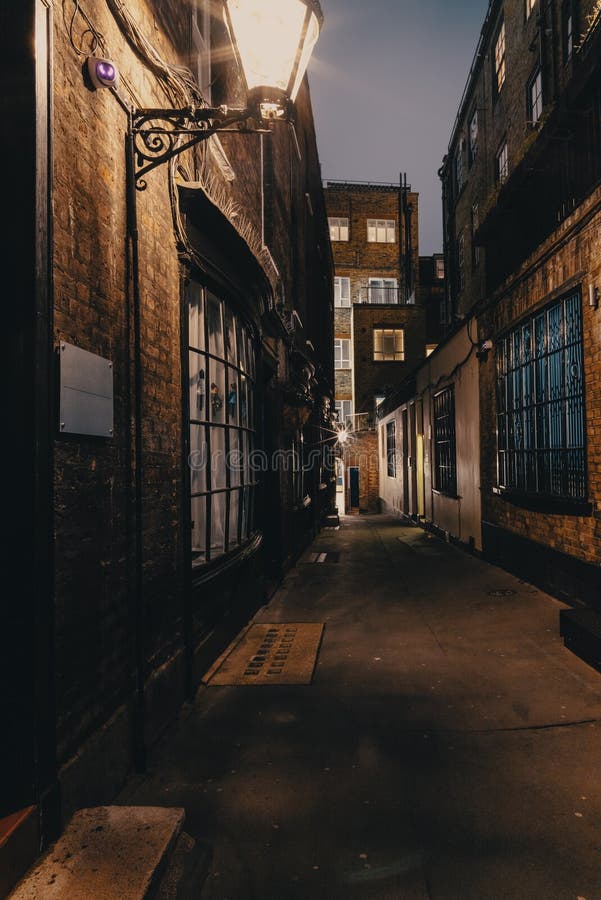 A Mysterious and Hidden Old Back Alley in London at Night Stock Photo ...