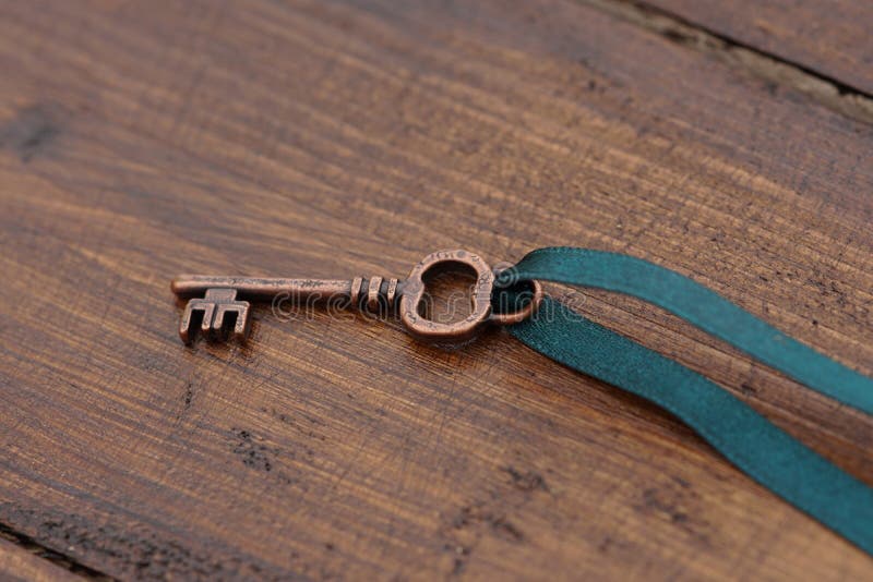 The Mysterious Key with Green Ribbon Stock Photo - Image of vintage ...