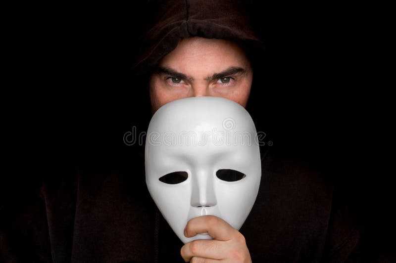 Mysterious Man in Black Hiding His Face Behind White Mask Stock Photo ... Mysterious Man in Black Hiding His Face Behind White Mask Stock Photo ...