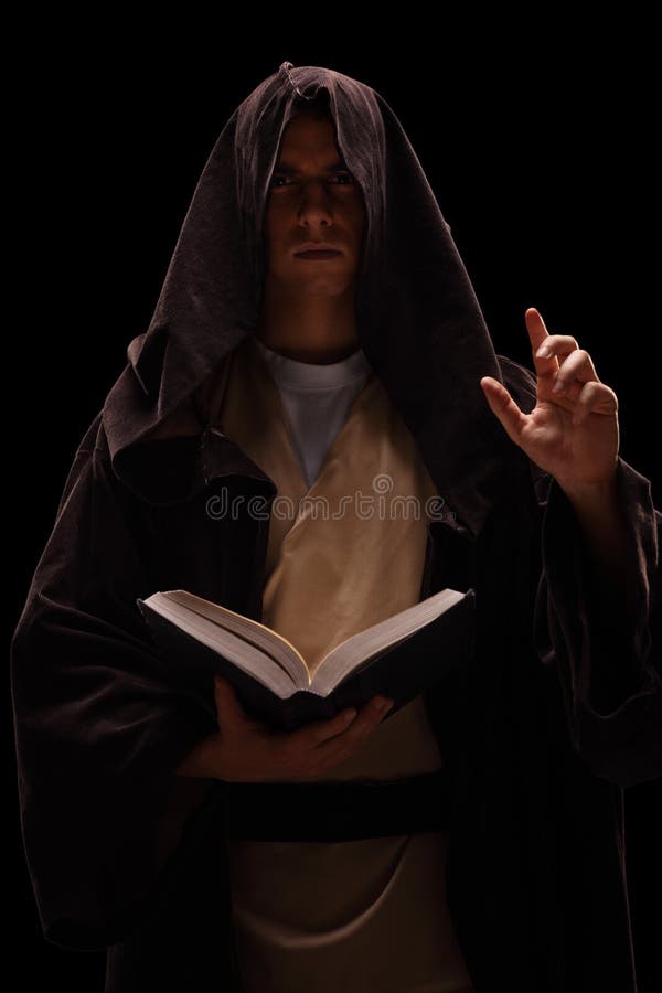 Mysterious Monk Holding a Book and Preaching Stock Photo - Image of ...