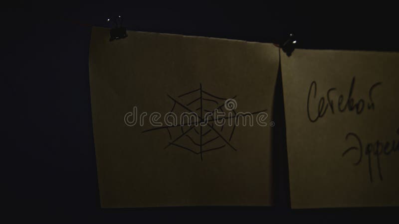 Mysterious Notes on Strings. Stock Footage. Notes with Encrypted Signs ...