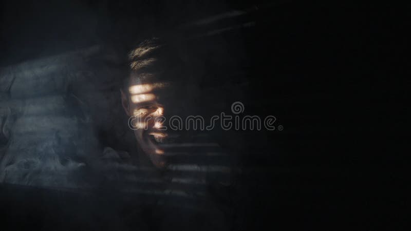 Mysterious Portrait of Man with Light and Shadow on Face Stock Photo ...