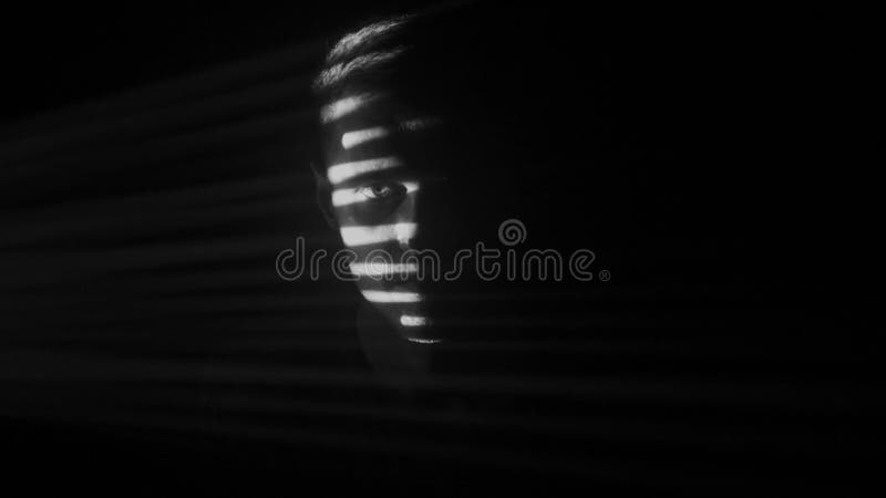 Mysterious Portrait of Man with Light and Shadow on Face Stock Footage ...