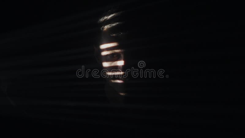 Mysterious Portrait of Man with Light and Shadow on Face Stock Video ...