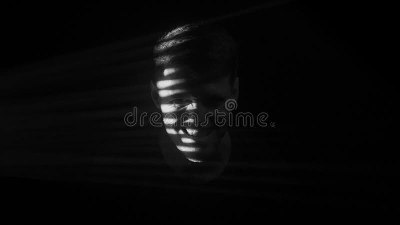 Mysterious Portrait of Man with Light and Shadow on Face Stock Footage ...