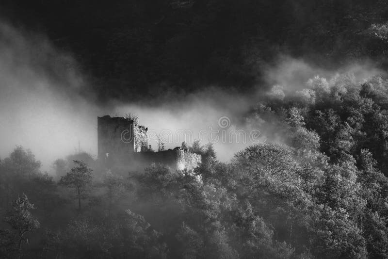 Mysterious Ruined Castle in the Mist Stock Photo - Image of mistn ...