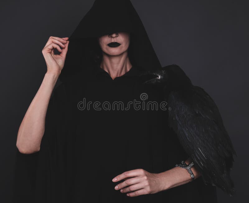 Mysterious Witch with Raven on Black Background Stock Image - Image of ...