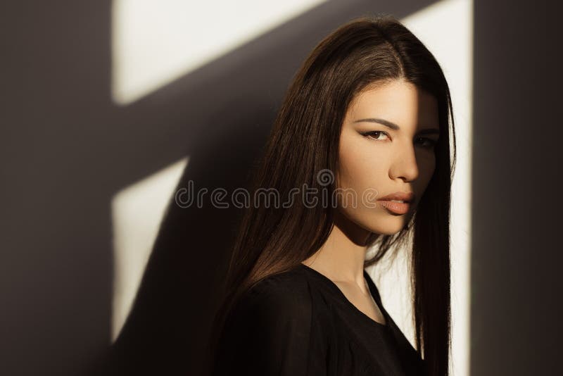 Mystery Woman with Dramatic Lighting and Shadow Stock Image - Image of ...