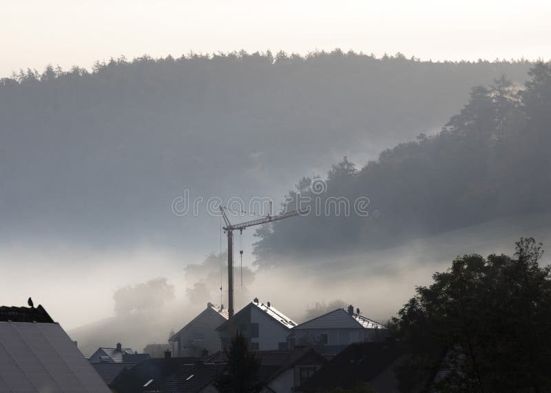Mystic Scenery Building Site in the Mountains with Crane and Fog Stock ...
