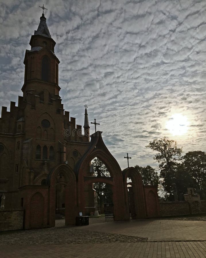 Mystical Composition of a Gothic Temple, Clouds and Sun. Stock Photo ...