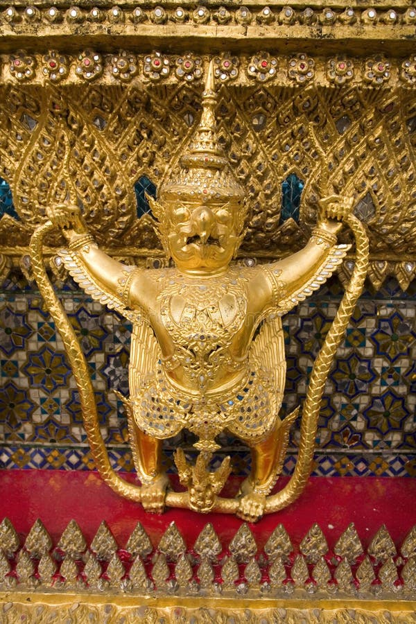 Mythical Gold Buddhist Statue Stock Photo - Image of figure, closeup ...