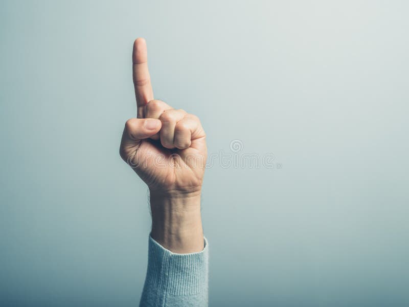 Mão Masculina Com O Dedo Que Aponta Acima Imagem de Stock - Imagem de ... Mão Masculina Com O Dedo Que Aponta Acima Imagem de Stock - Imagem de ...