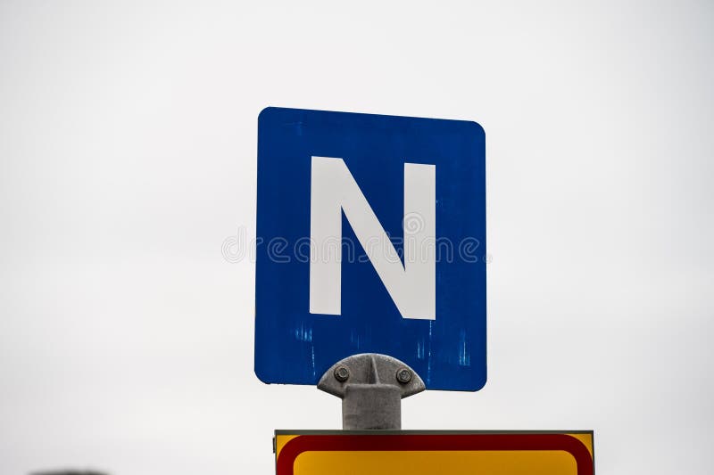 N sign on top of a pole.. stock image. Image of view - 315715507