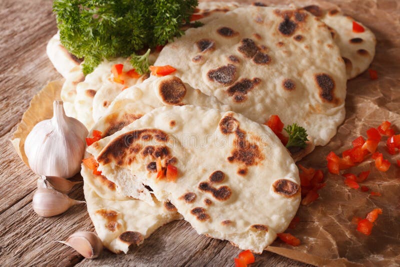 Naan Flat Bread with Garlic Close-up. Horizontal Stock Image - Image of ...