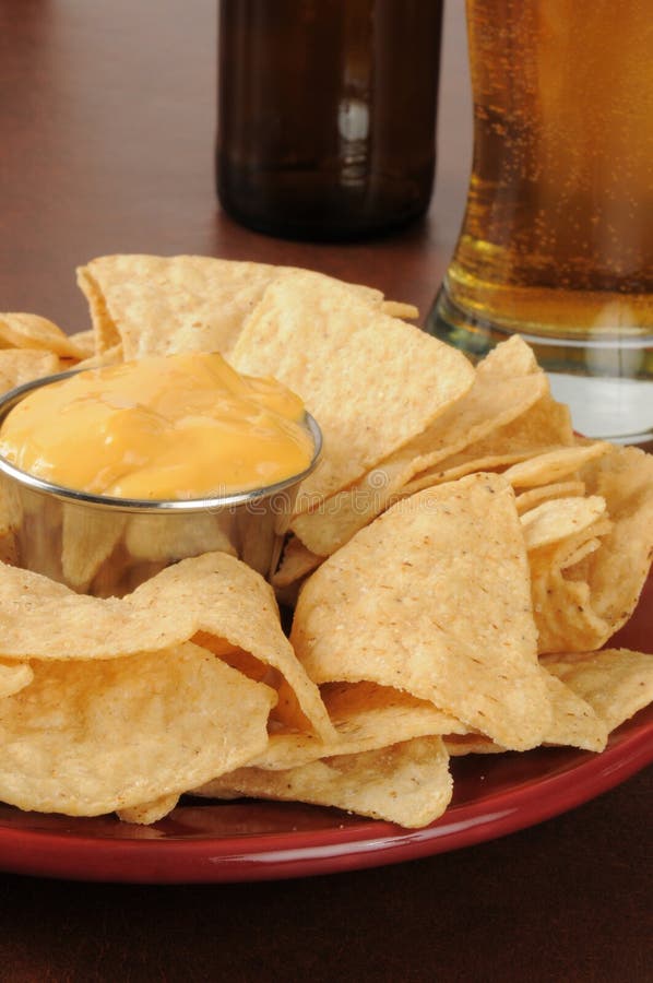 Bar food, nachos and beer stock image. Image of cheese - 33441325