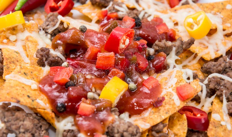 Nachos with Meat and Cheese (Macro Shot) Stock Photo - Image of snacks ...