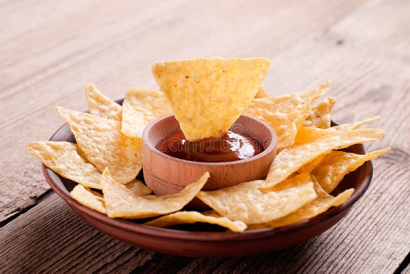 Nachos with Sauce on the Table Stock Photo - Image of snacks, salsa ...
