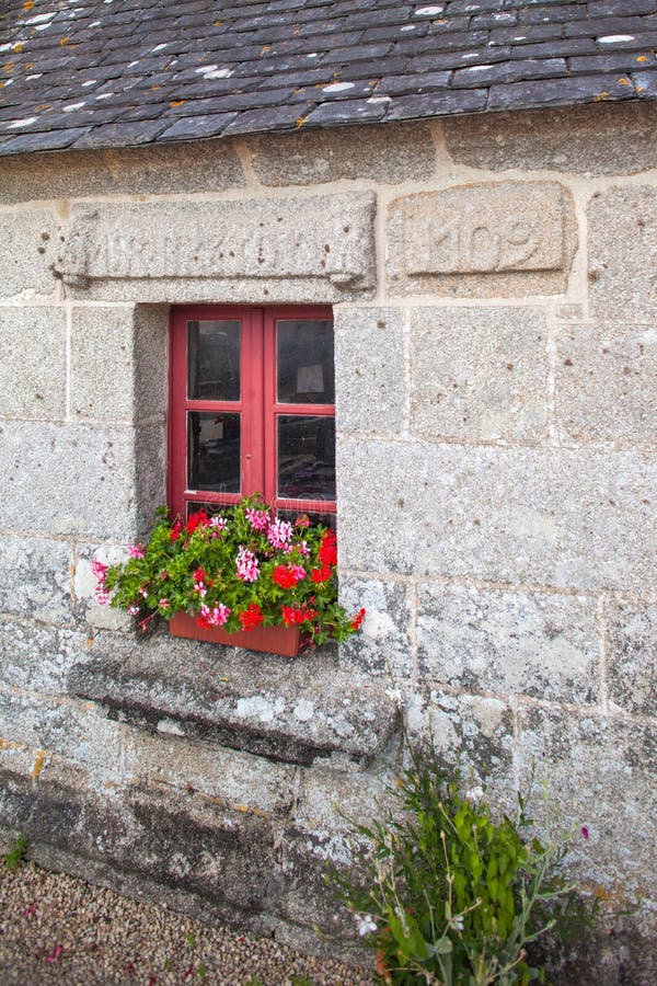 Nacient Wall with Red Framed Window and Flowers Stock Image - Image of ...