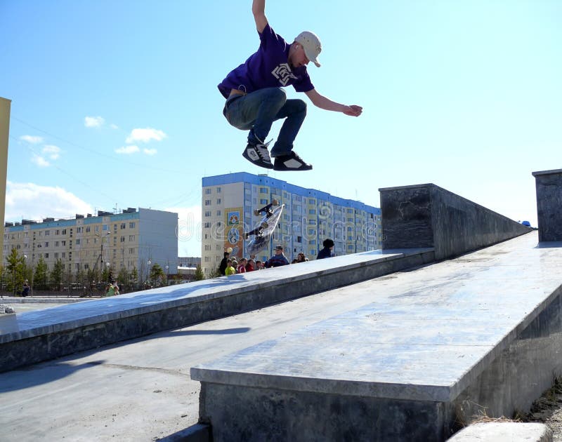 Nadym, Russia - May 17, 2008: Jumping on Board with a Springboard ...