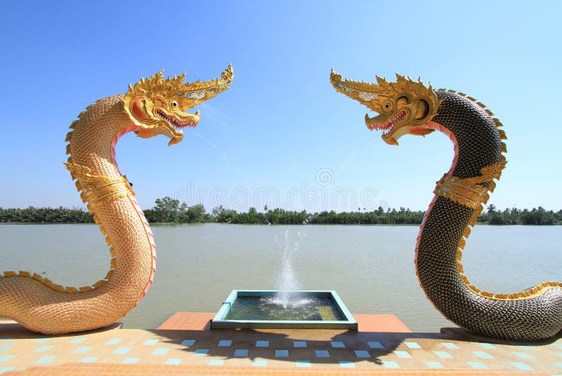 Naga statue by the river stock image. Image of artistic - 75031057