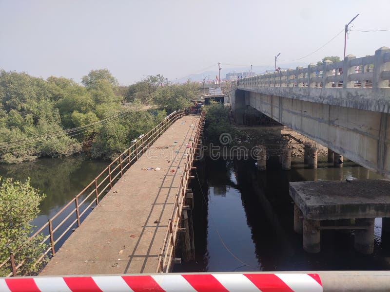 Naigaon East Mumbai bridge editorial photography. Image of water ...