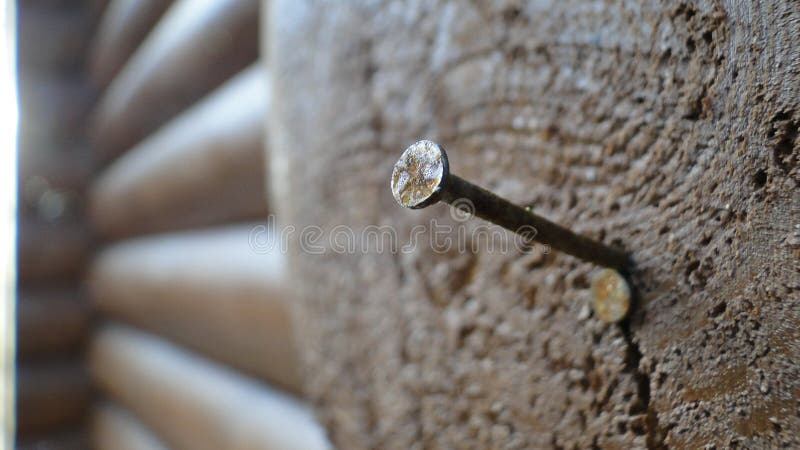 A nail in the beam stock photo. Image of house, abstraction - 35422752