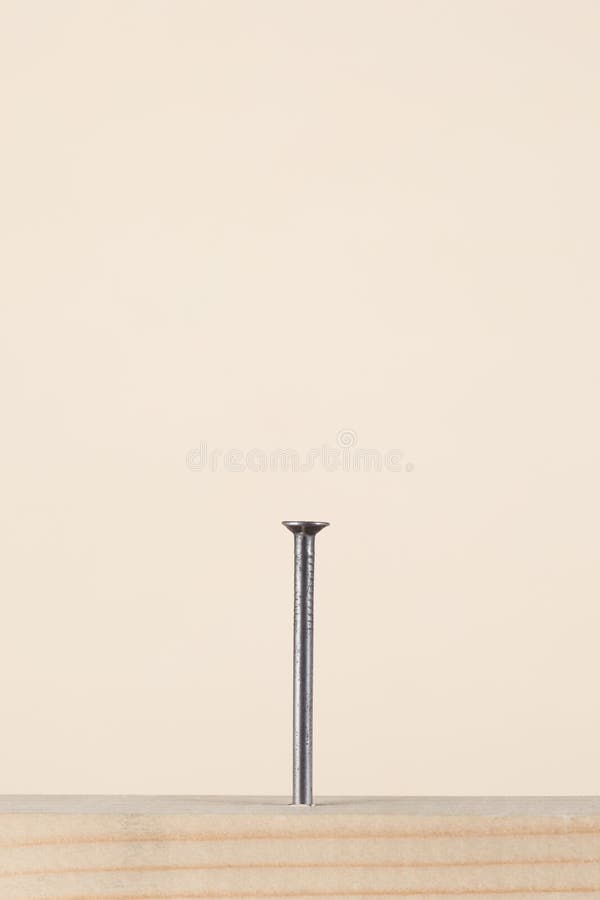 Nail Fixed in a Wooden Board Stock Image - Image of conceptual ...