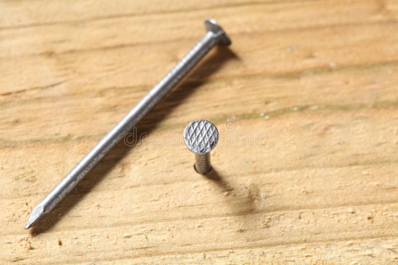 Nail Fixed in a Wooden Board Stock Image - Image of copy, board: 131587031