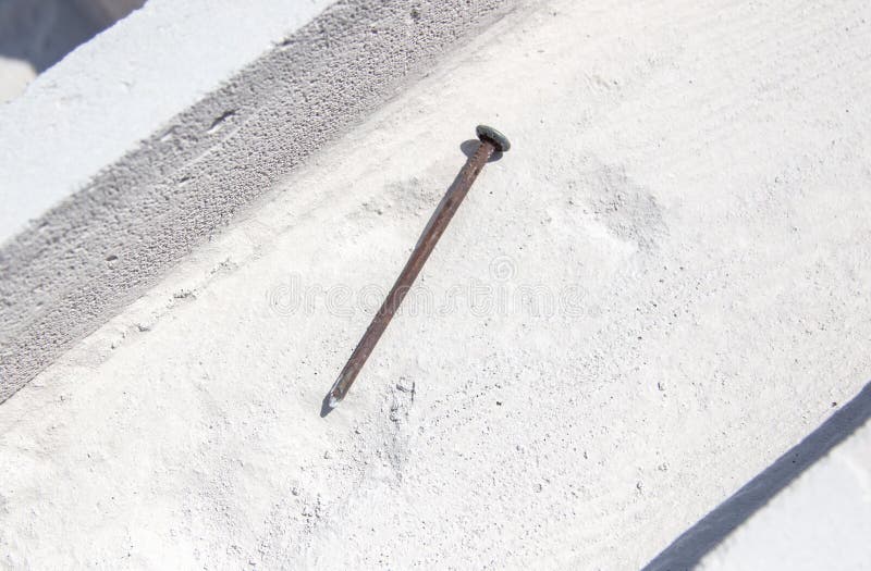 A Nail at a House Construction Site Stock Image - Image of table, site ...