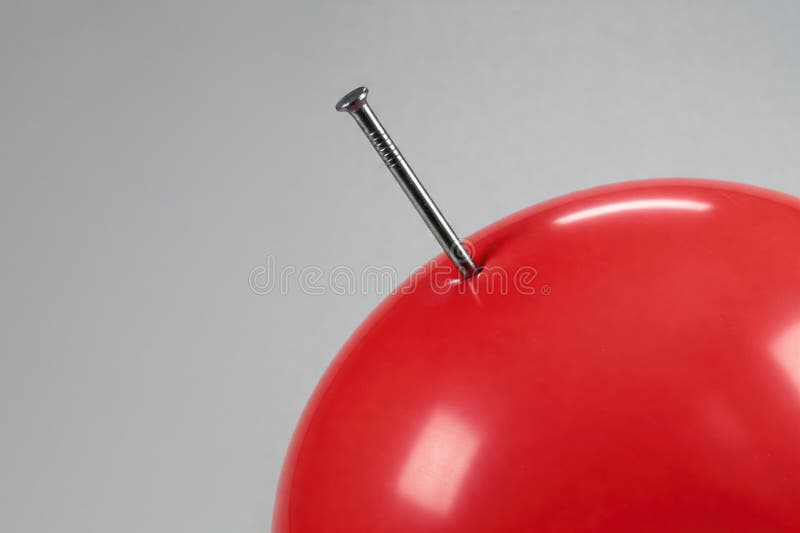 A Nail Stuck in a Red Balloon. Space for Text. Stock Photo - Image of ...