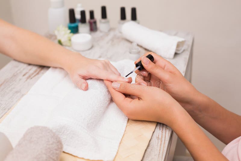 Nail Technician Giving Customer a Manicure Stock Image - Image of towel ...