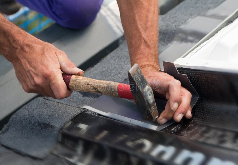 Nailing on metal sheet stock photo. Image of labor, steel - 17328762