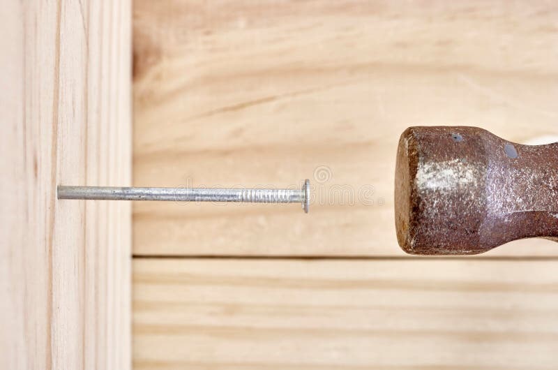 Nailing into Wood stock photo. Image of hardware, pattern - 89410084