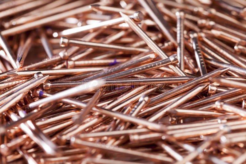 Nails are Covered with a Thin Layer of Copper Colored Metal Stock Image ...