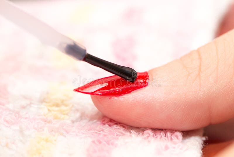 Nails Painted Red Nail Polish in a Beauty Salon Stock Photo - Image of ...