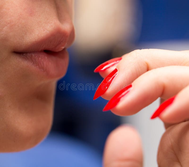 Nails Painted Red Nail Polish in a Beauty Salon Stock Photo - Image of ...