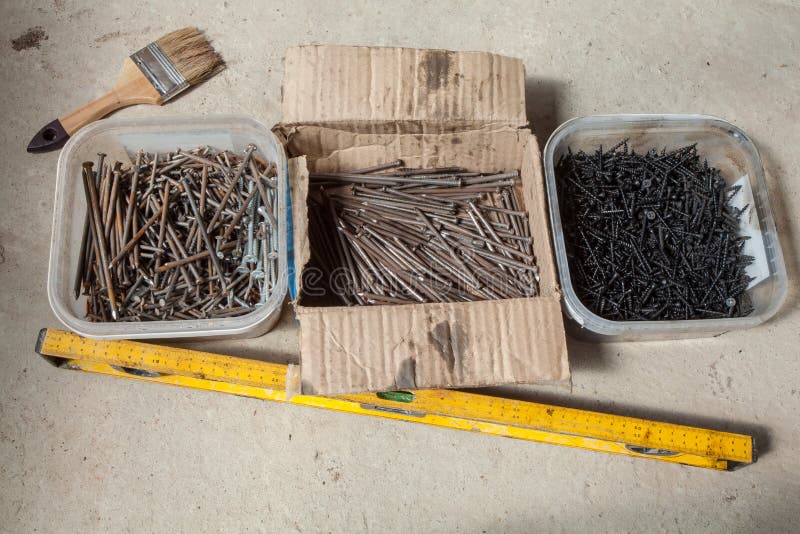 Nails and Screws are in the Plastic and Paper Boxes, Industrial Level ...