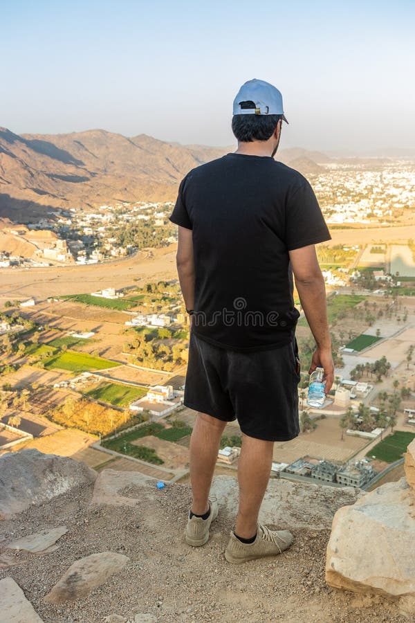 NAJRAN, SAUDI ARABIA - NOVEMBER 27, 2021: Local Men Looking at Najran ...