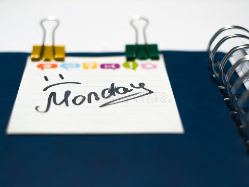 The Name of the Day of the Week Written on a Sticky Sheet in a Blue ...