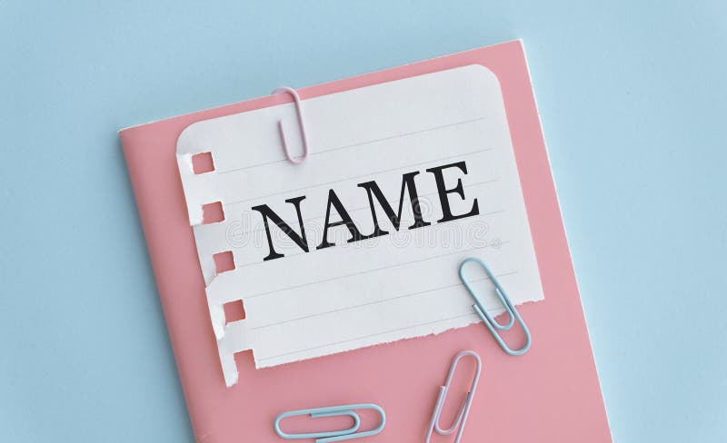NAME Text Written on Notepad on the Blue Background Stock Photo - Image ...