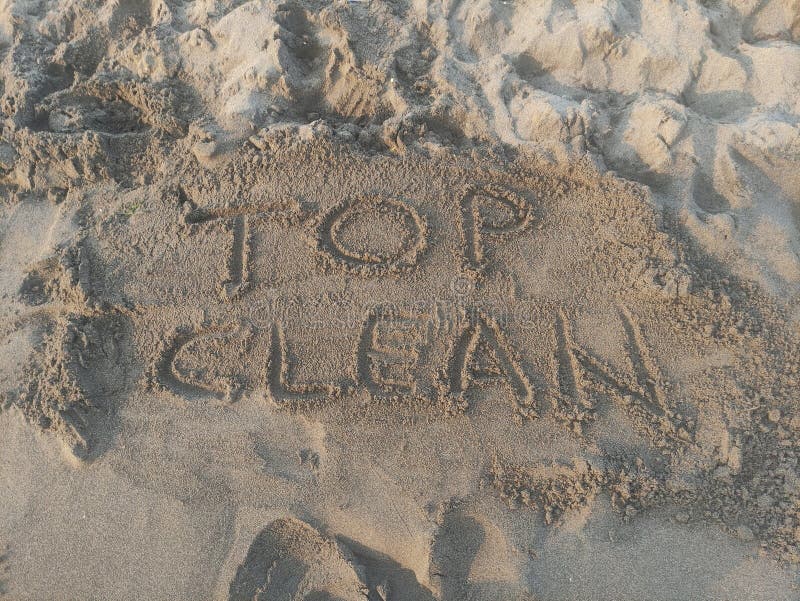 The Name TOP CLEAN Written in the Sand on the Beach Stock Photo - Image ...