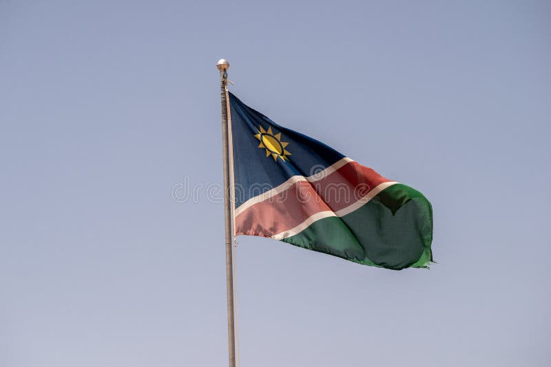 Namibia flag on the wind stock photo. Image of symbol - 344788814