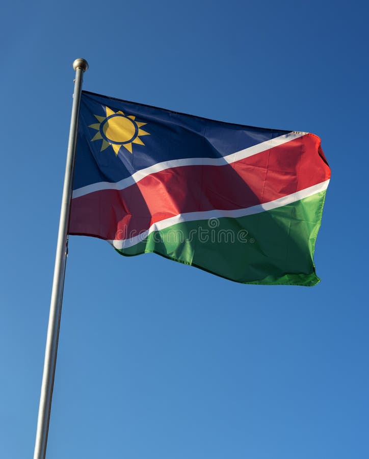 Namibia National Flag Swinging Under the Sky Stock Image - Image of ...