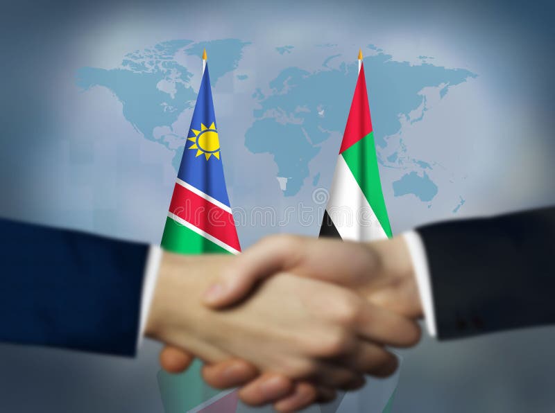 Two People Shaking Hands in Front of UAE and Namibia Flags Stock ...