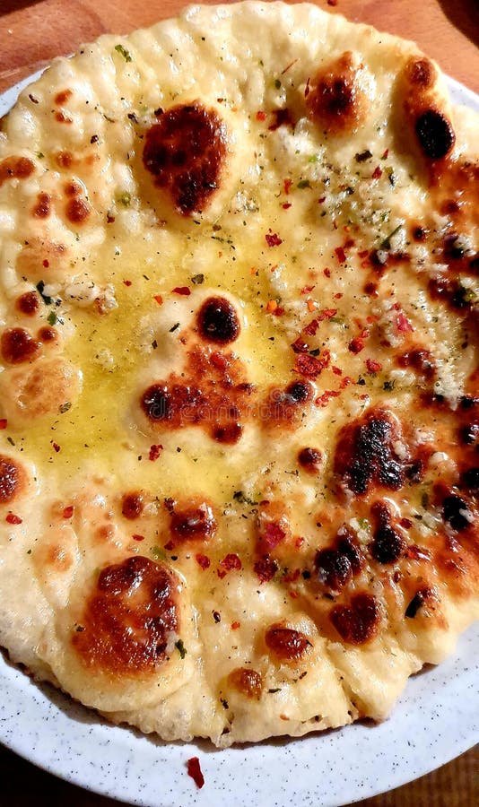 Nan Bread with Garlic and Olive Oel Stock Photo - Image of bread, fish ...