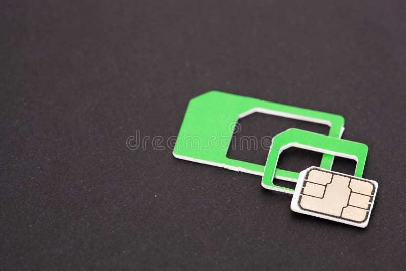 Nano Sim Card Extract from Sim Card Adaptor on Dark Background Stock ...