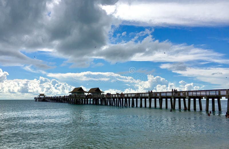 Naples Pier and Beach in Florida at Sunset Editorial Photo - Image of ...
