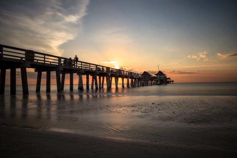 Naples Pier on the Beach at Sunset Stock Image - Image of ocean ...