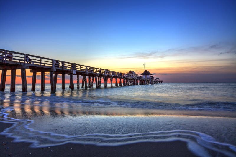Naples Pier on the Beach at Sunset Stock Photo - Image of gulf, high ...