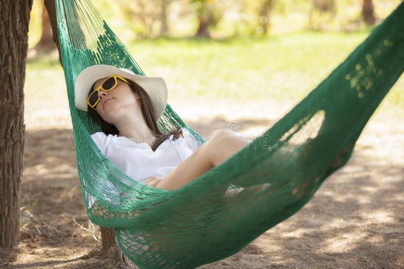 Napping in a Hammock Outdoors Stock Image - Image of shade, spring ...